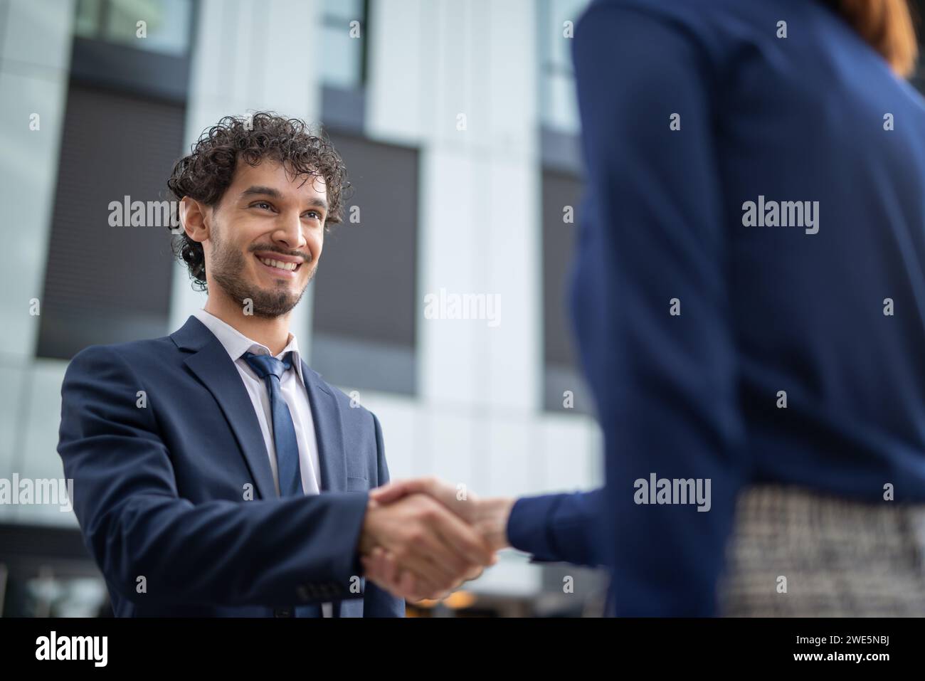 Business people handshake outdoor Stock Photo - Alamy