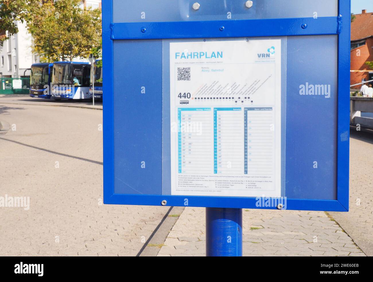 close-up timetable, blue, white, outside, buses parking background ...