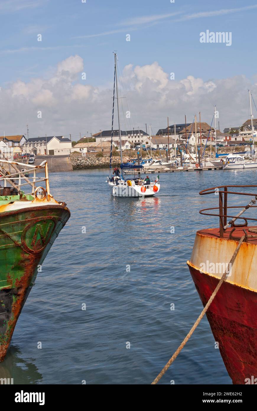 Ireland County Wexford Kilmore Quay sailboat entering harbour Stock ...