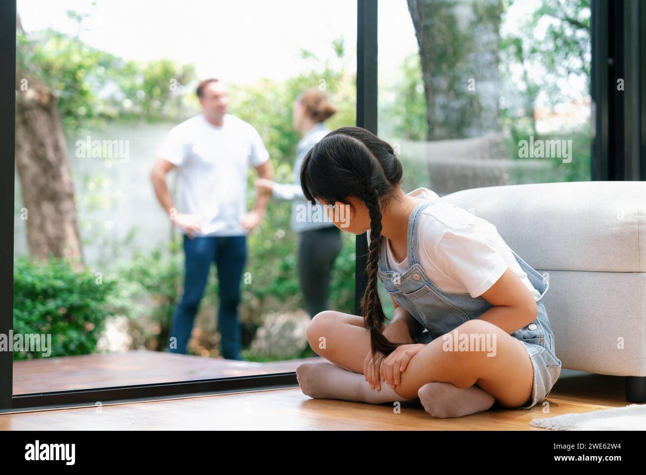 Stressed and unhappy young girl huddle in corner crying and sad while ...