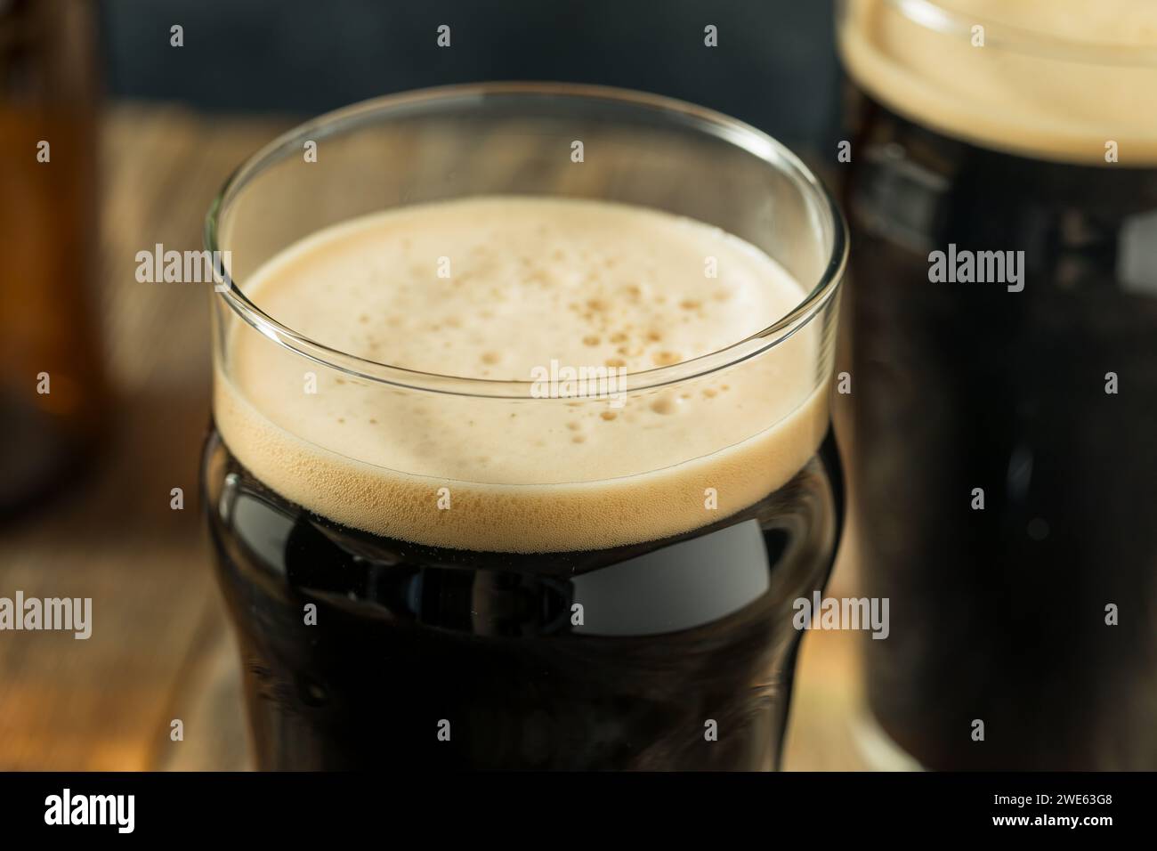 Dark beer in glass hi-res stock photography and images - Alamy