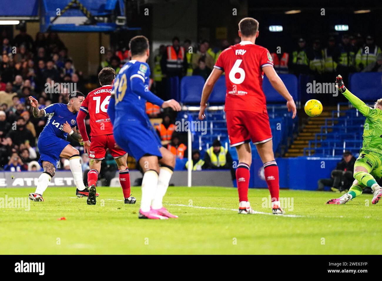 Chelsea's Enzo Fernandez (left) scores their side's second goal of the ...
