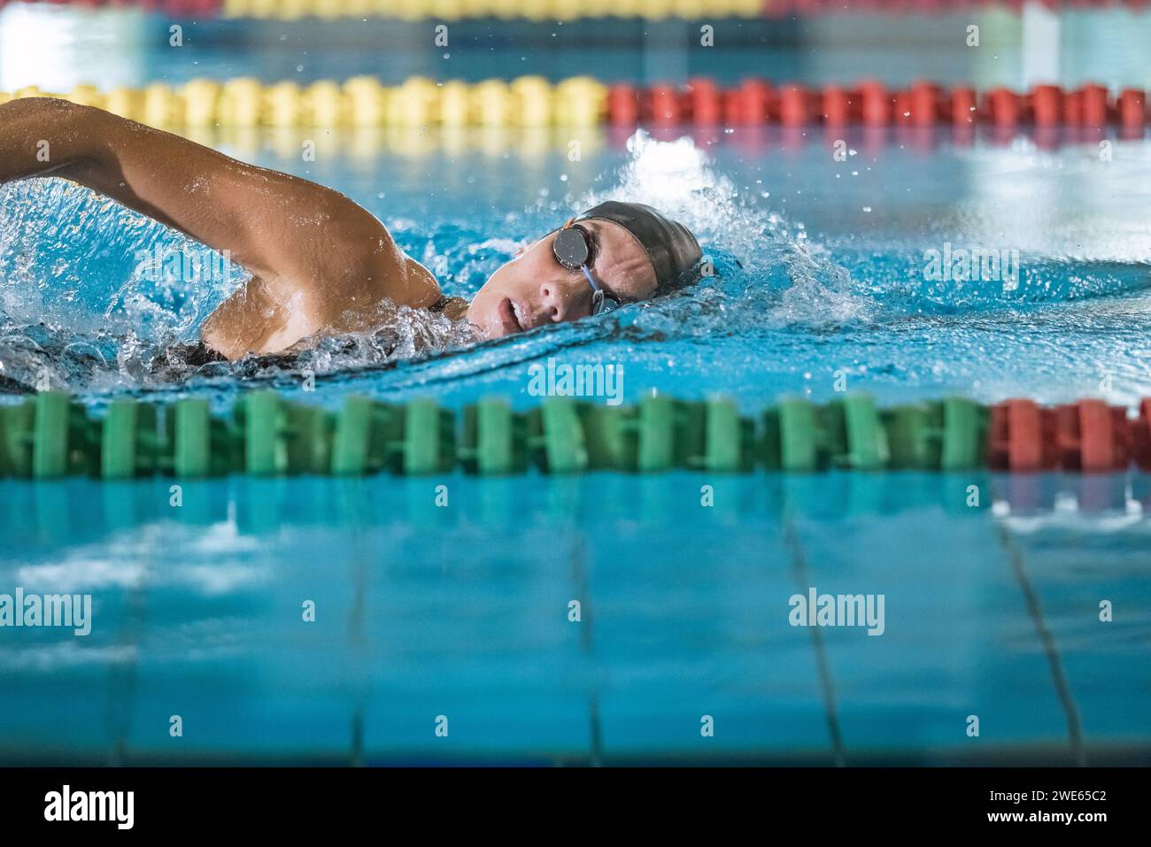 Elite female athlete, professional swimmer during a front crawl ...