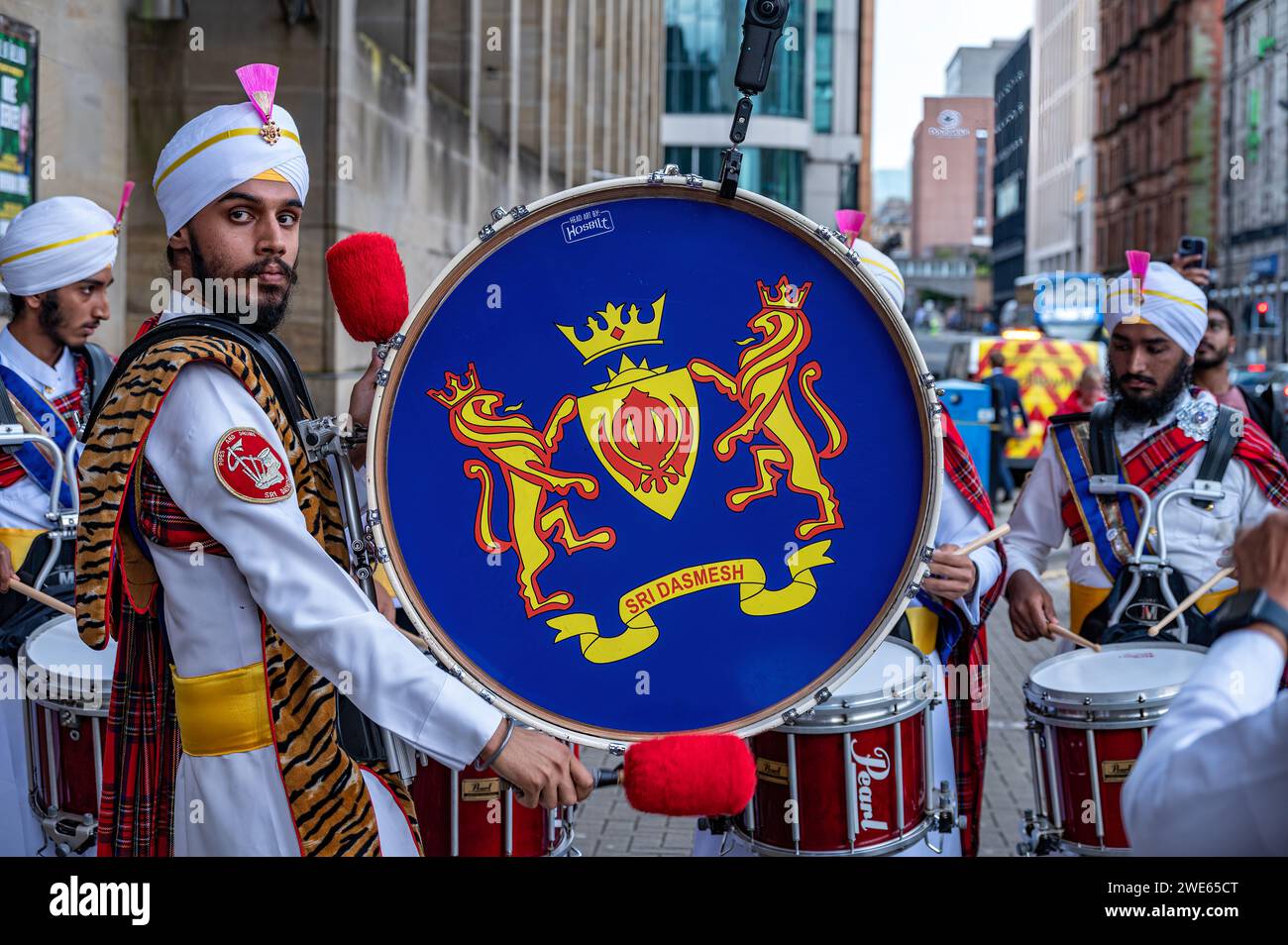 Drummesr from the Sri Dasmesh Pipe Band practicing outside Glasgow ...