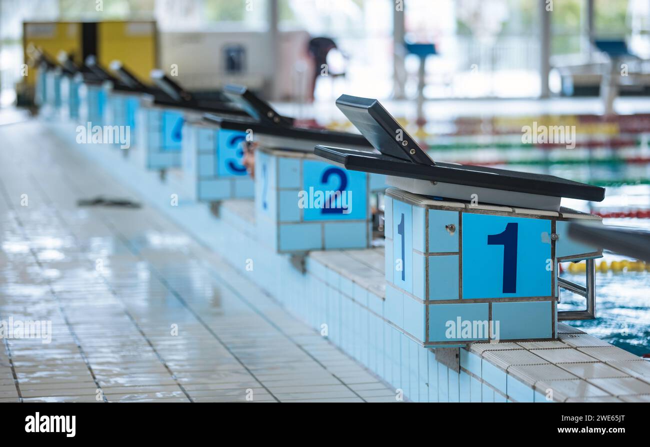 Empty sport competition swimming pool with lanes Stock Photo - Alamy