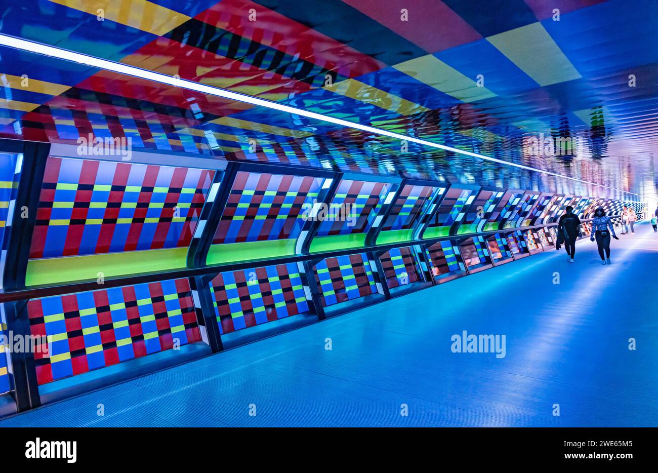 Brightly coloured Adams Plaza Bridge, Canary Wharf London England Stock ...