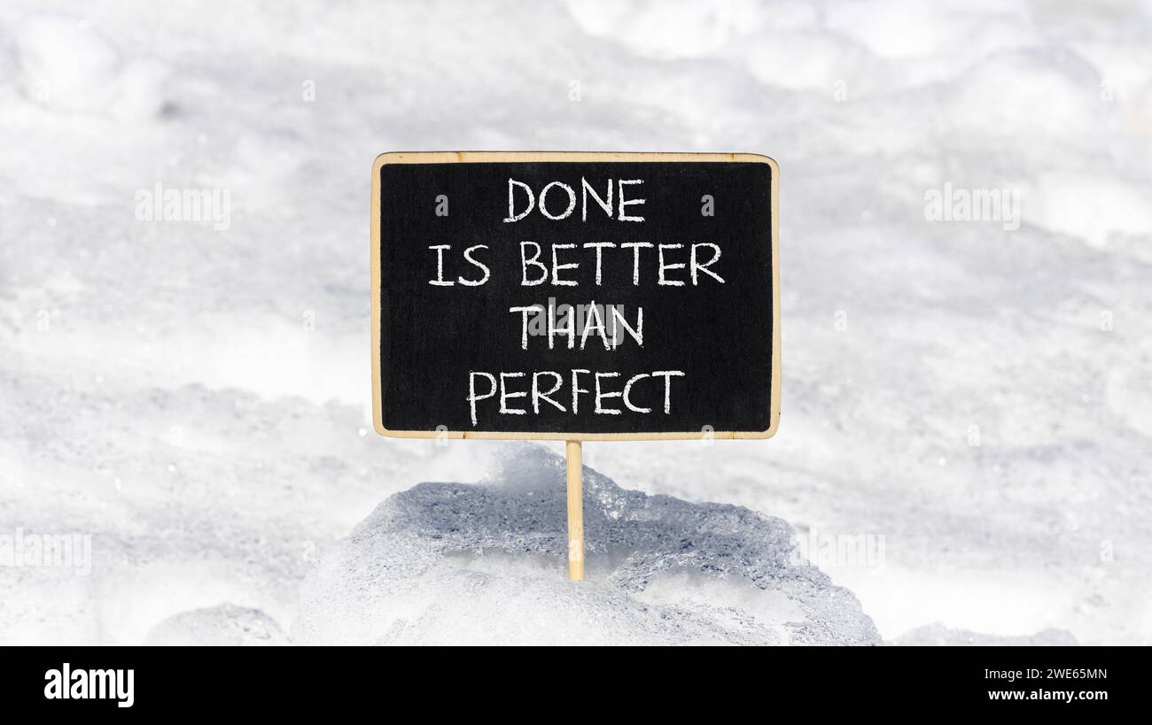 Done is better than perfect symbol. Concept words Done is better than ...