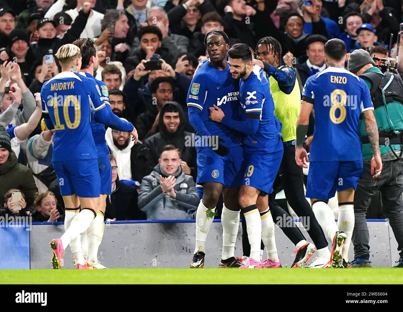 Chelsea's Axel Disasi (centre) celebrates scoring their side's third ...