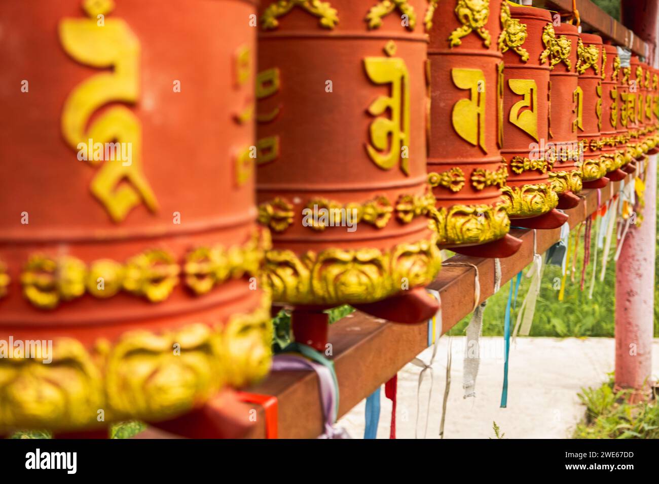 Rotating religious elements for touching turning spinning Buddhist ...