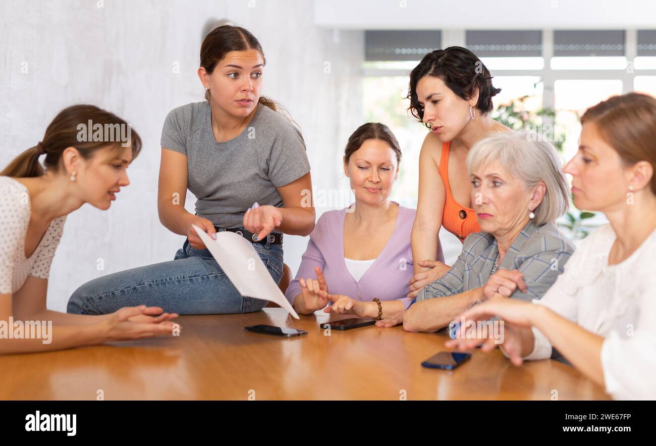 Female students learning course subject together in university ...