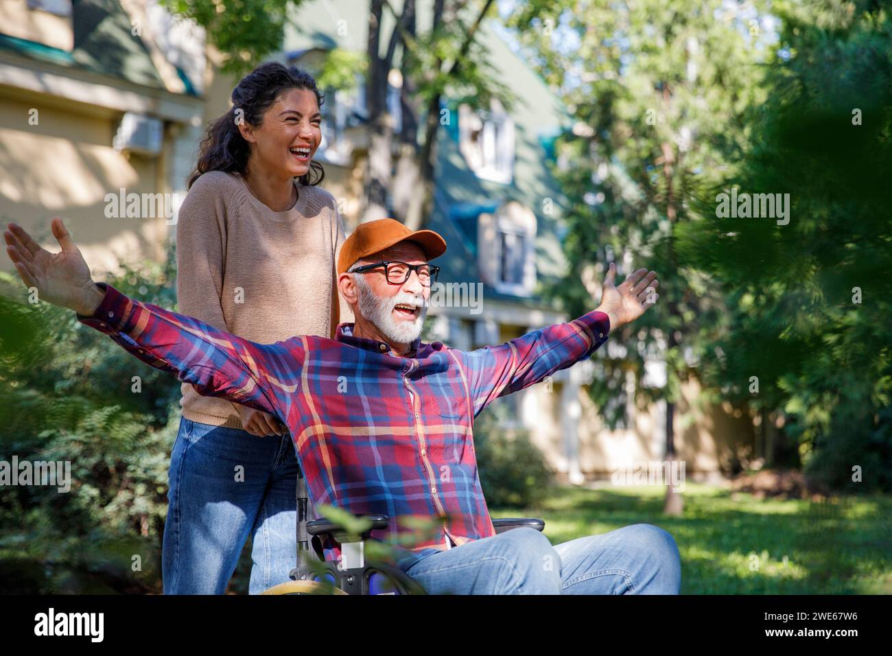 Cheerful wheelchair man hi-res stock photography and images - Alamy