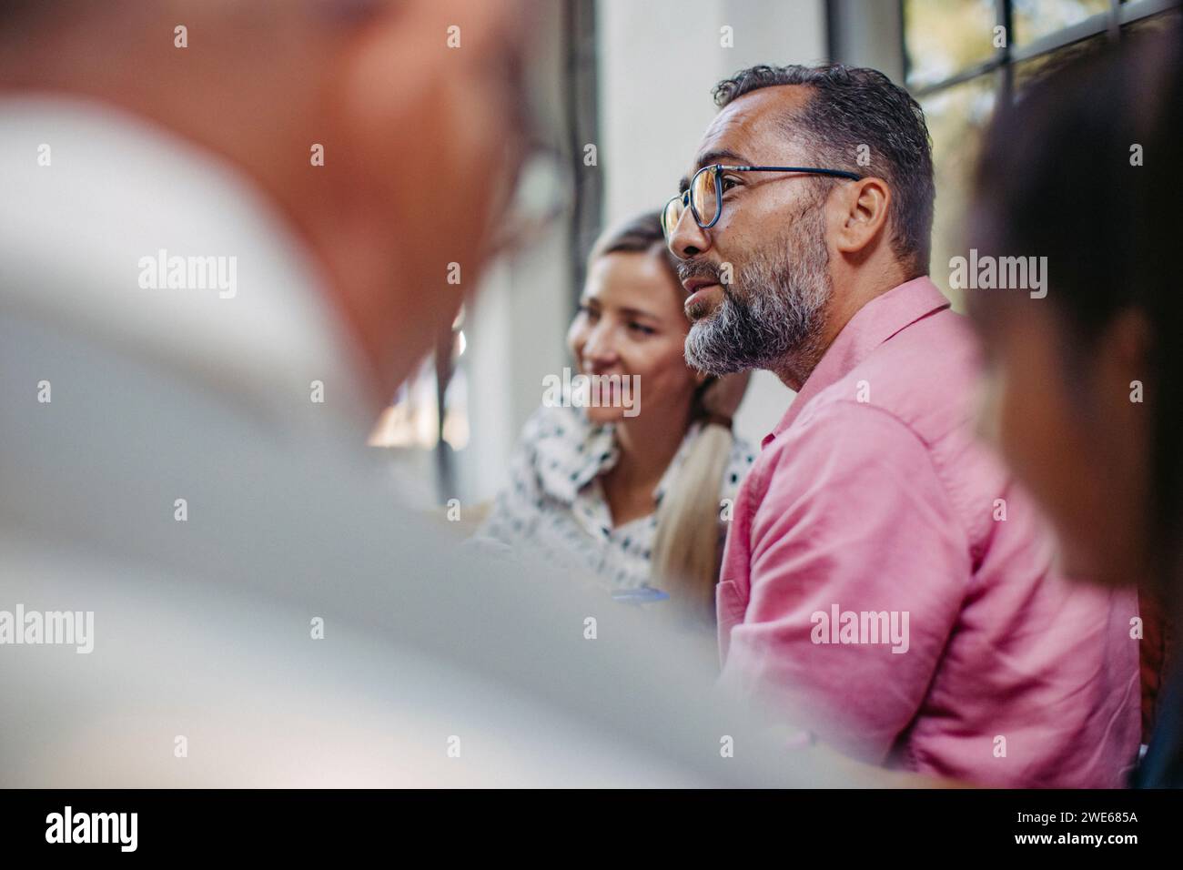 People having a neighborhood meeting at community building Stock Photo ...