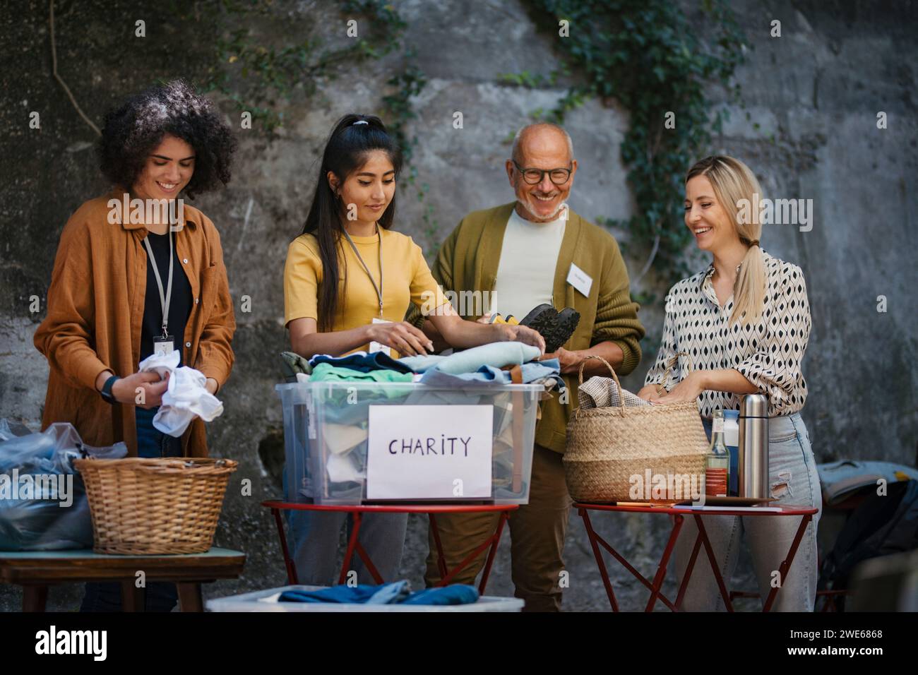 Woman sorting her clothes hi-res stock photography and images - Alamy