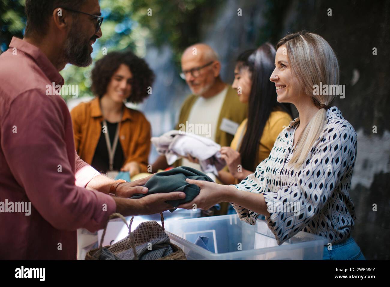 Donating people hi-res stock photography and images - Alamy