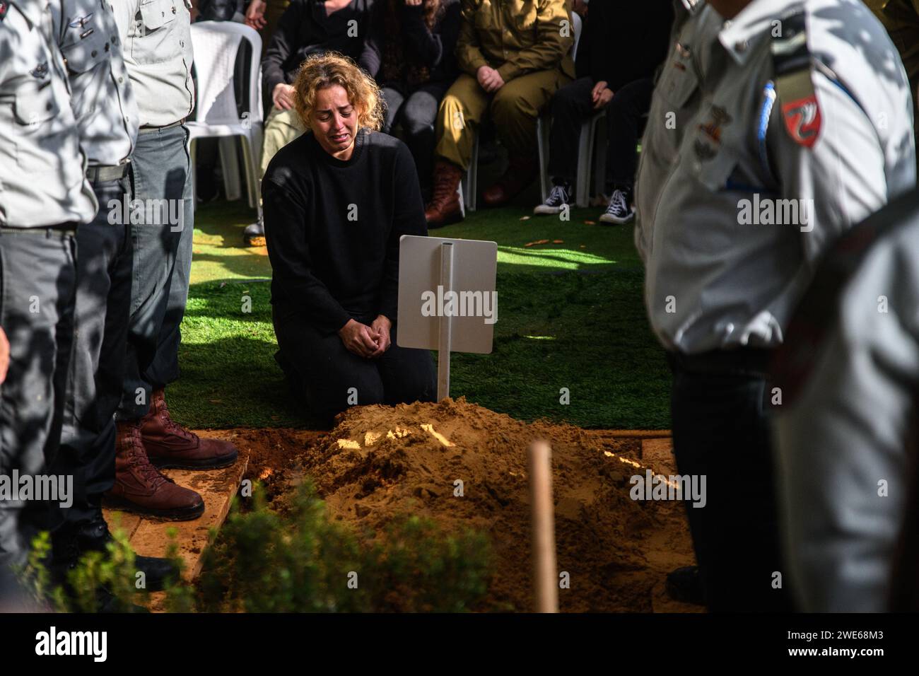 Israel. 23rd Jan, 2024. Israeli mother mourns during the funeral of her ...