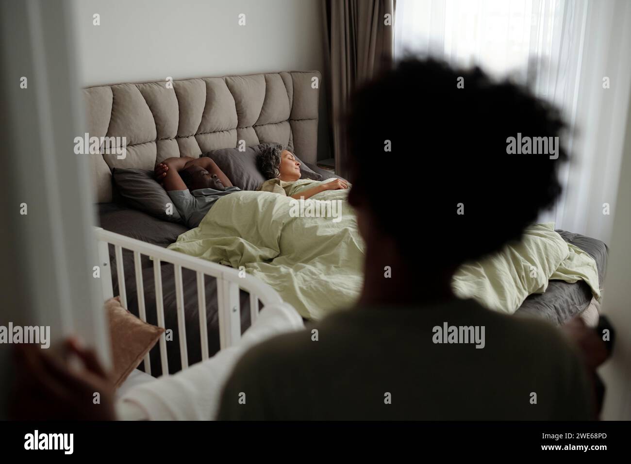 African woman sleeping on bed hi-res stock photography and images - Alamy