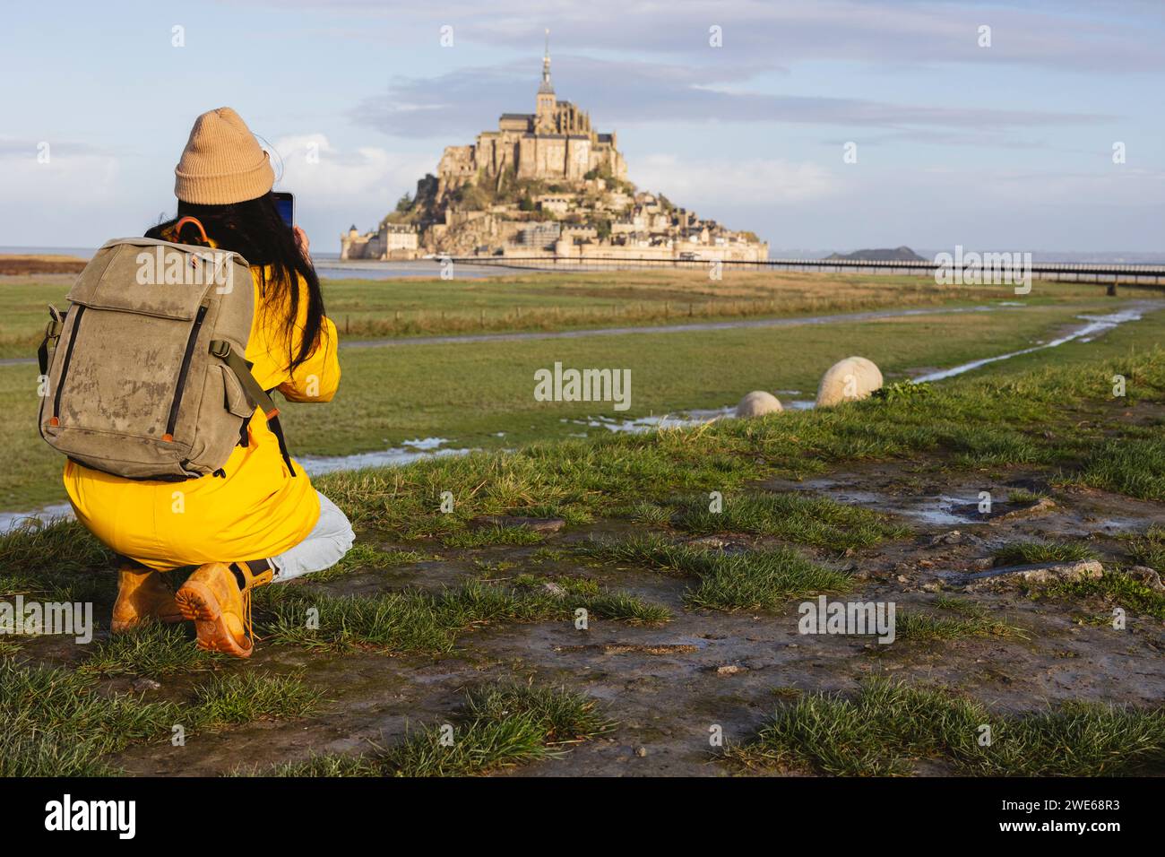 Traveler looking at Saint Michel castle in front of sky Stock Photo - Alamy