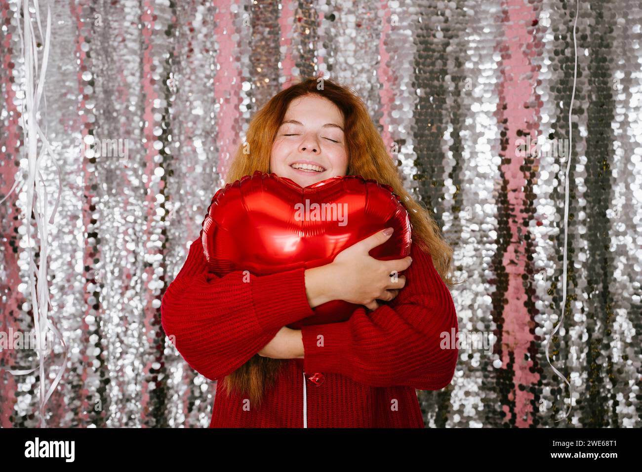 Woman heart balloon in arm hi-res stock photography and images - Alamy