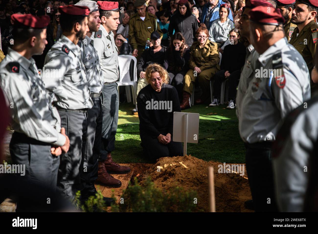 Israel. 23rd Jan, 2024. Israeli mother mourns during the funeral of her ...