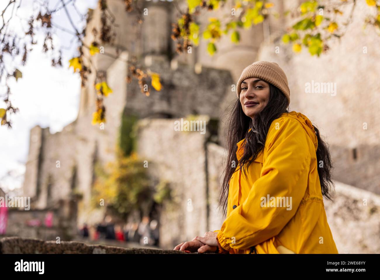 Beautiful woman wearing knit hat in front of Saint Michel castle Stock ...