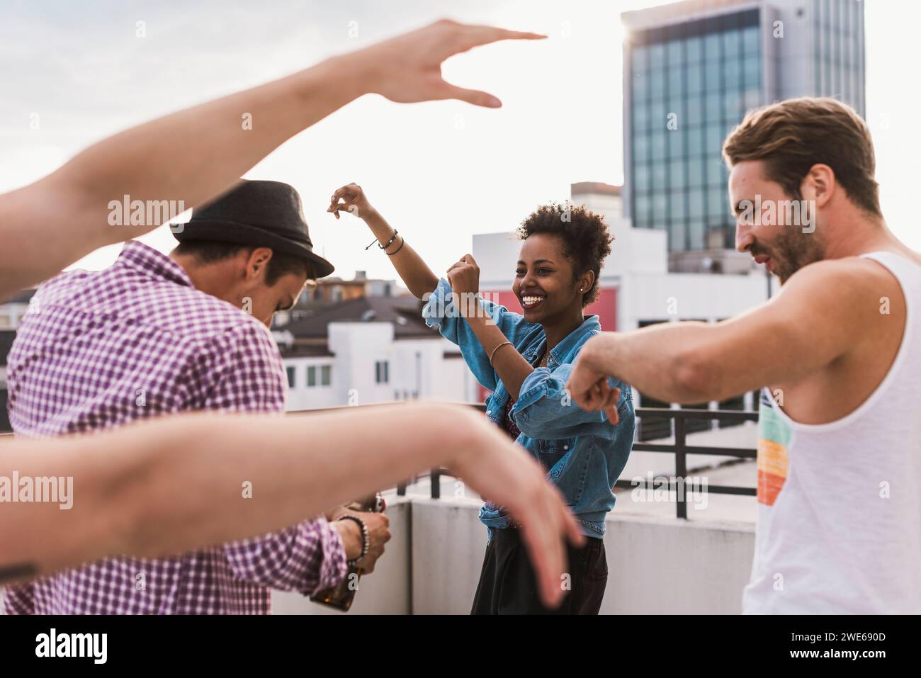 Multicultural group young friends dancing hi-res stock photography and ...