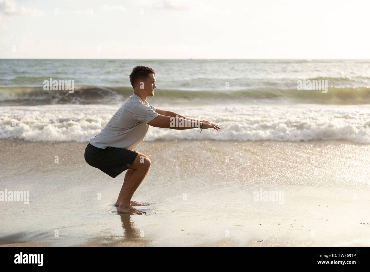 Squatting hi-res stock photography and images - Alamy