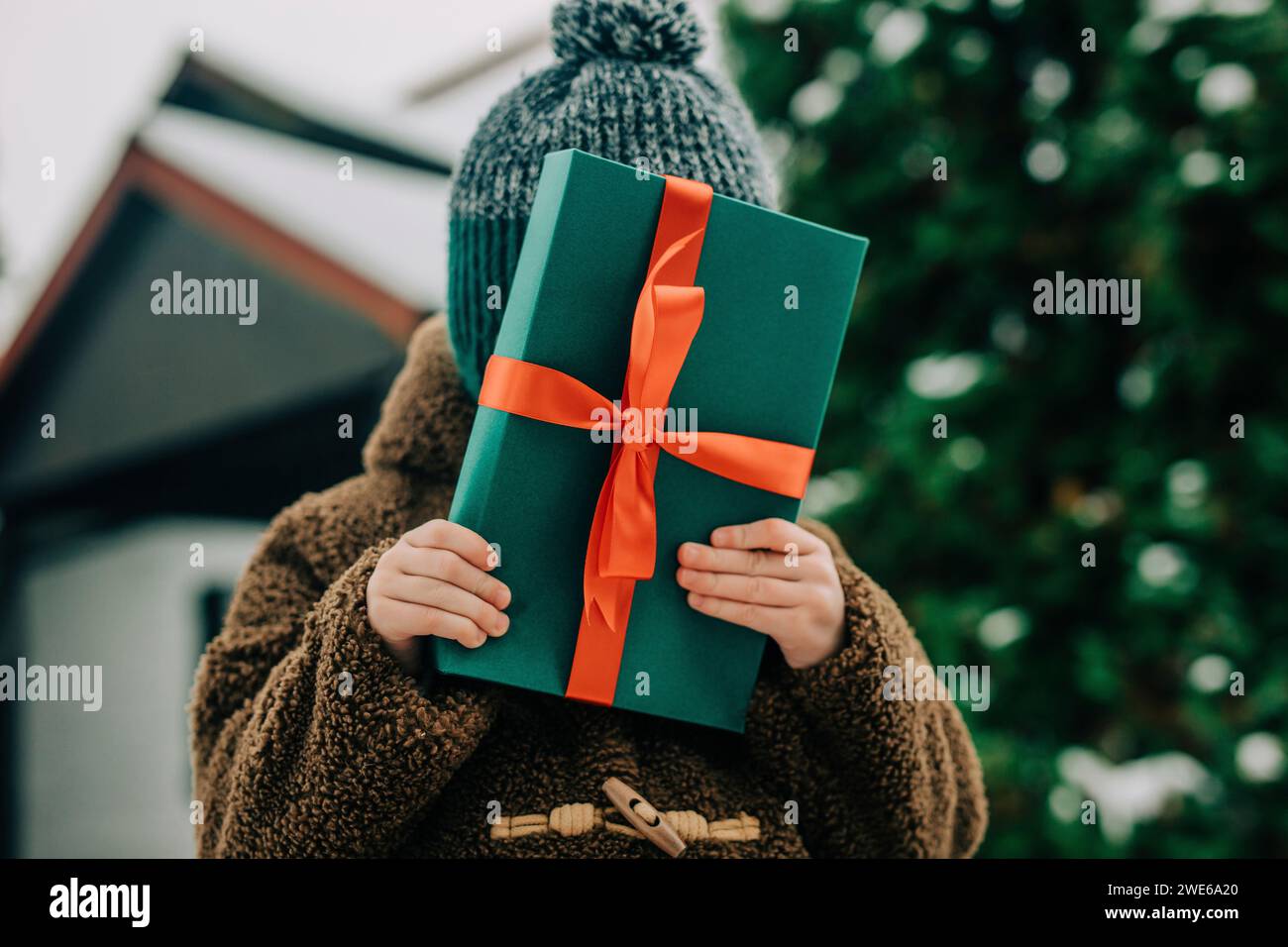 Boy hiding face hi-res stock photography and images - Alamy