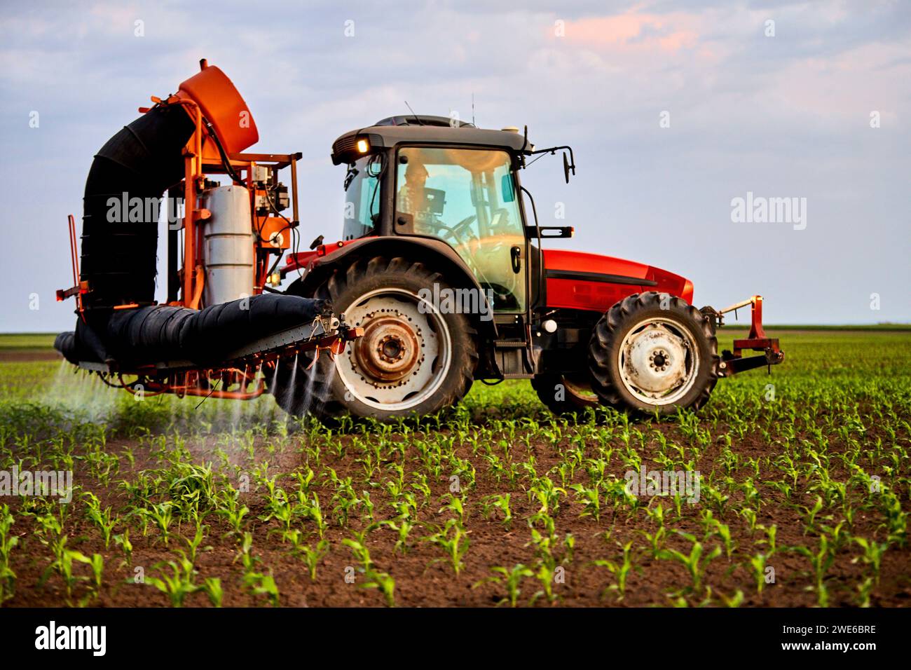 Agriculture farmer spraying fertilizer hi-res stock photography and ...