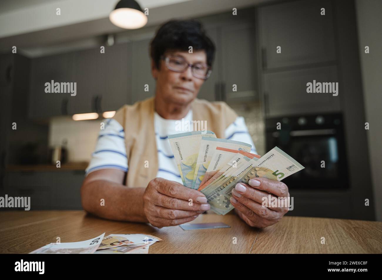Woman counting money planning budget hi-res stock photography and ...