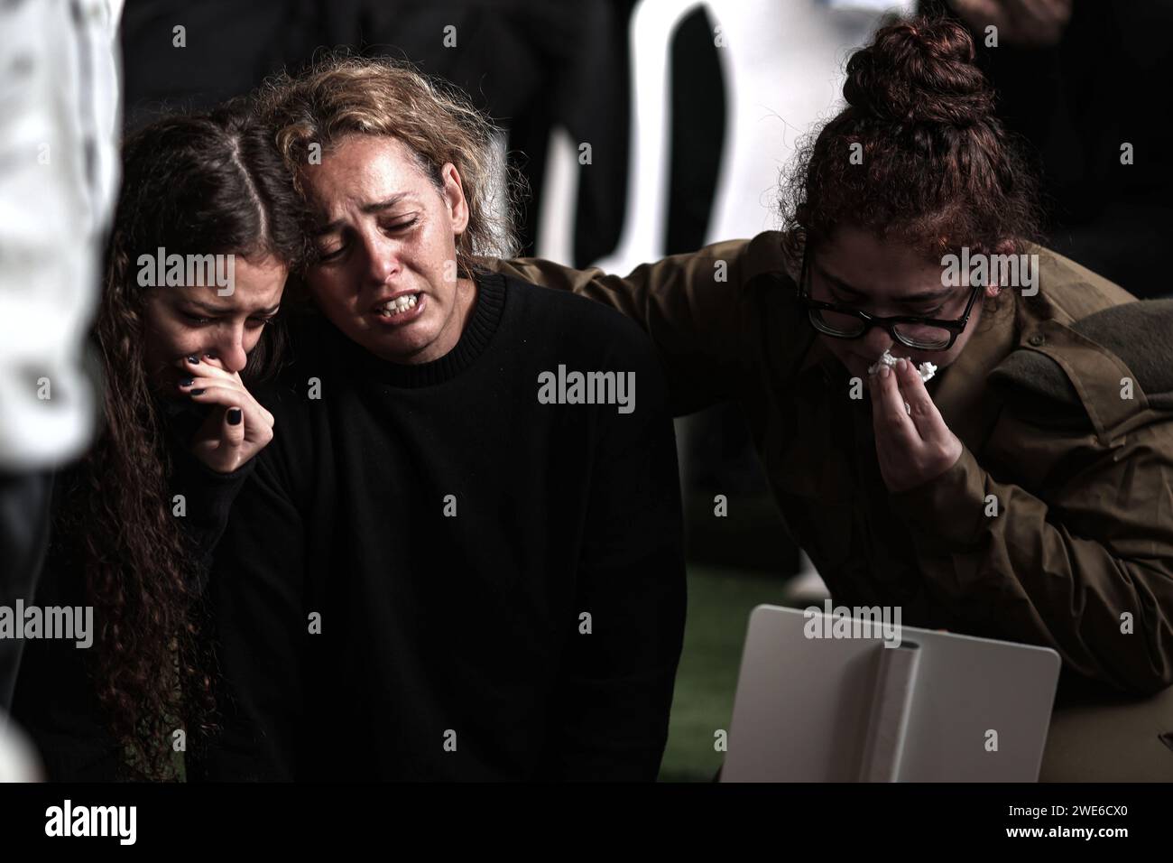 Tel Aviv, Israel. 23rd Jan, 2024. Israelis mourn during the funeral of ...