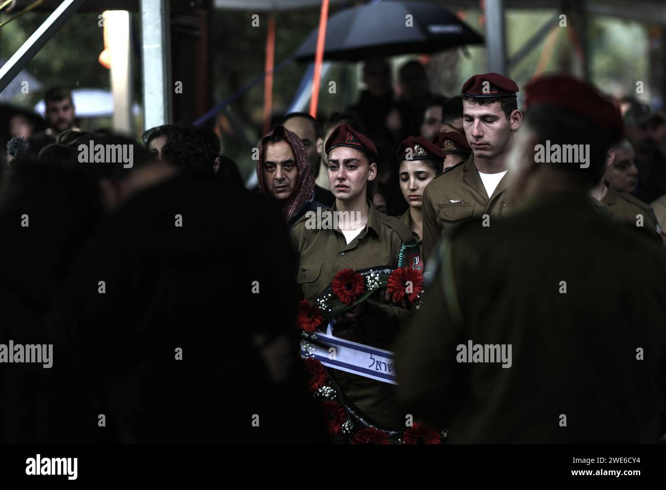 Tel Aviv, Israel. 23rd Jan, 2024. Israelis mourn during the funeral of ...
