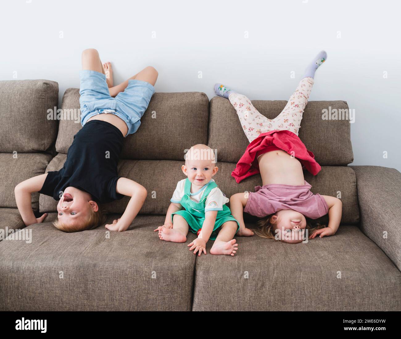 Girl doing headstand hi-res stock photography and images - Alamy