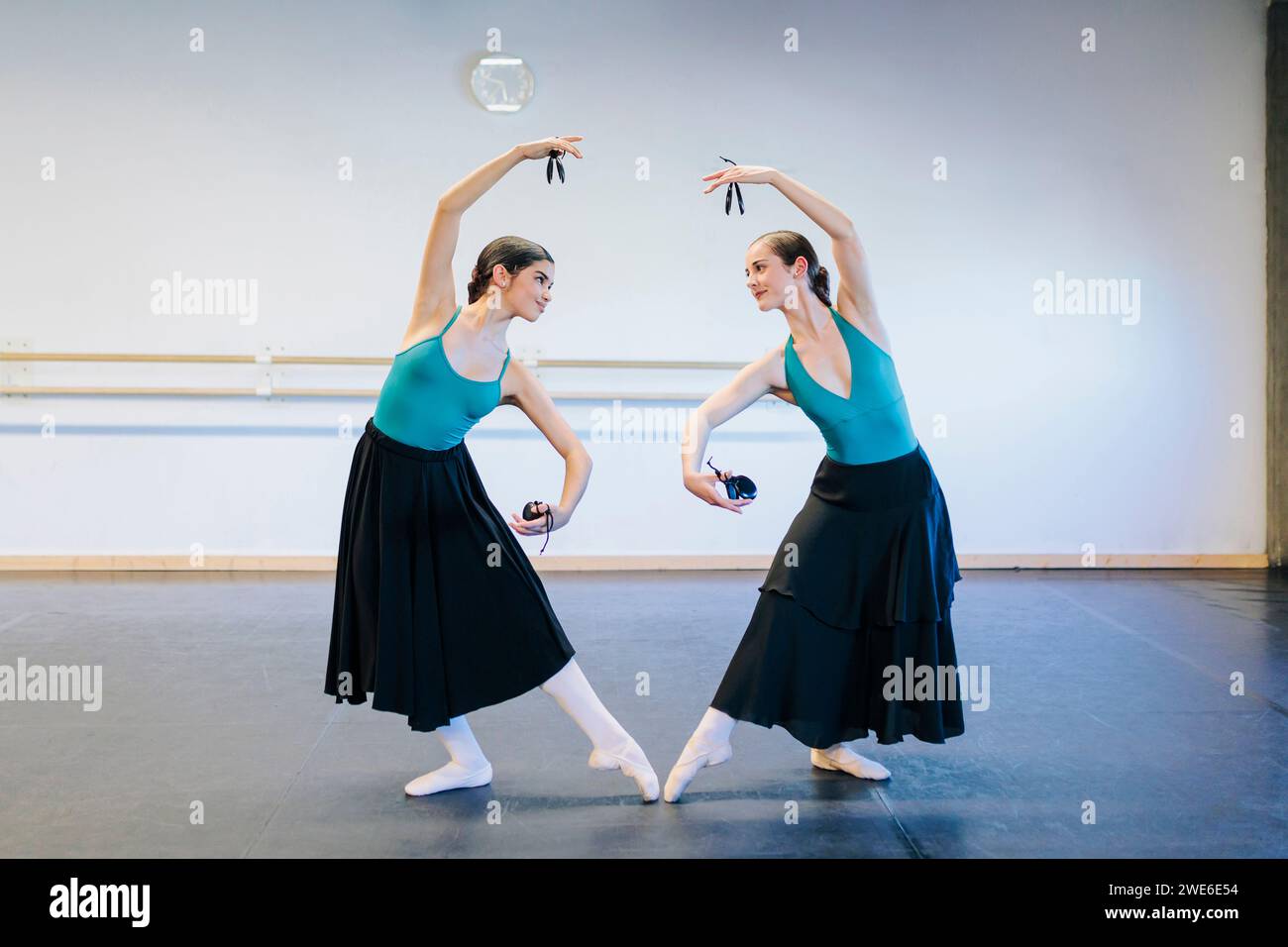 Flamenco dancers practicing with each other at dance studio Stock Photo ...