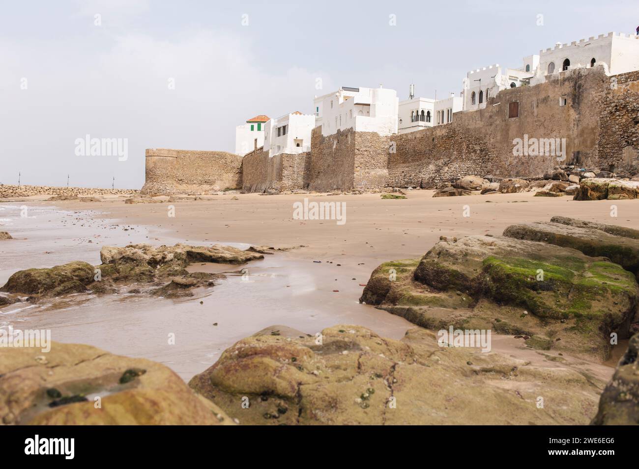 Beach near sea walls of Asilah, Morocco, Africa Stock Photo - Alamy