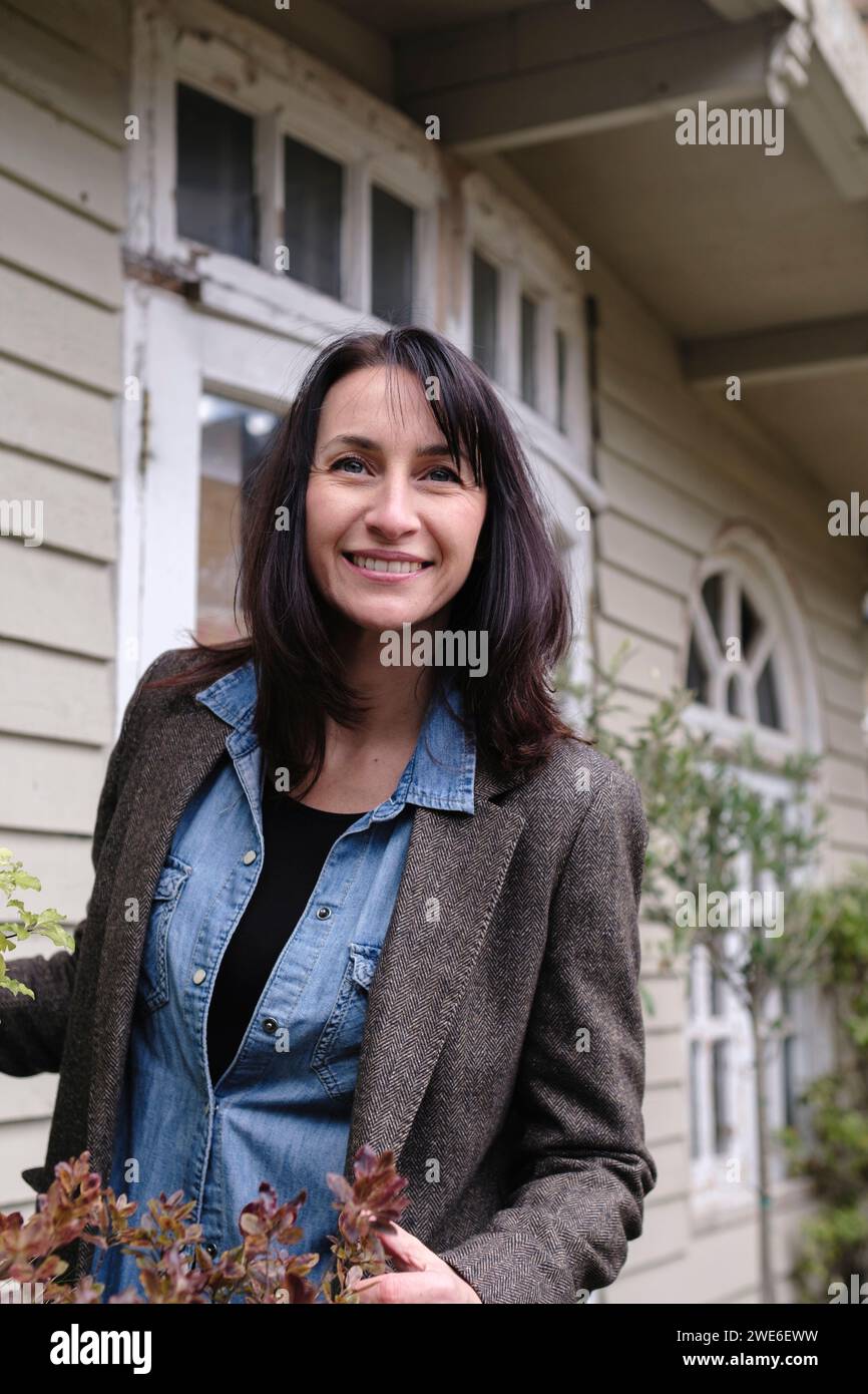 Woman house building leaf hi-res stock photography and images - Alamy