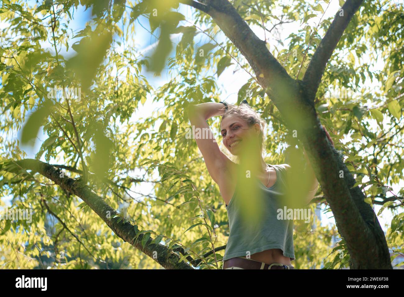 Woman raised arm hi-res stock photography and images - Alamy