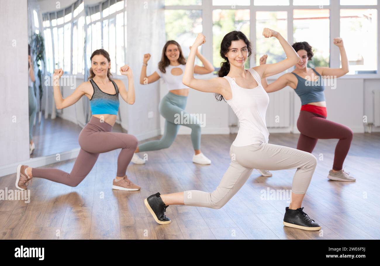 Group of women dancing modern dance in studio Stock Photo - Alamy