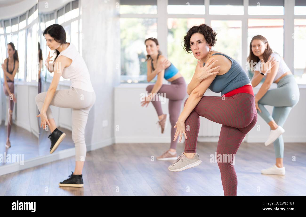 Female teacher conducts modern dance lessons for group of girls Stock ...