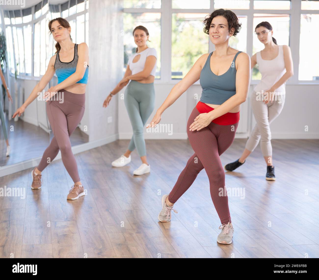 Slender young women dancers dance twist in modern way Stock Photo - Alamy