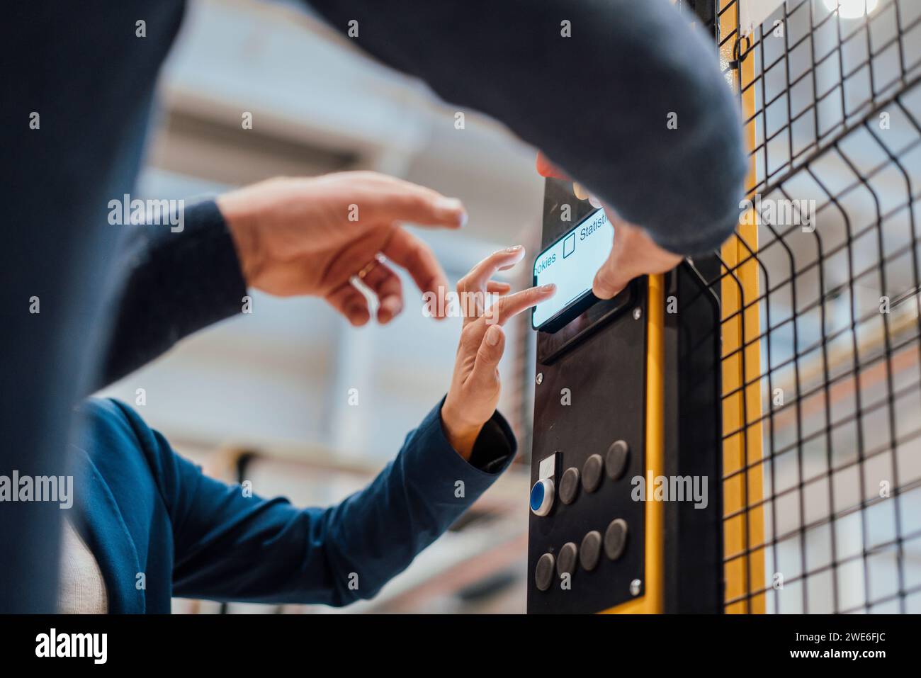 Engineers operating control panel in industry Stock Photo - Alamy