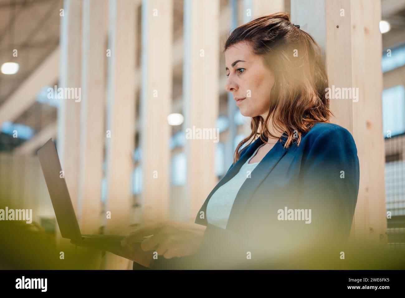 Woman working focused on laptop hi-res stock photography and images - Alamy
