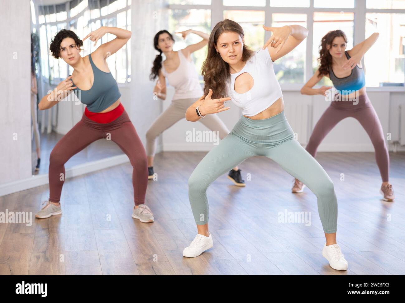 Group are practising movement in step jazz dance in fitness gym Stock ...