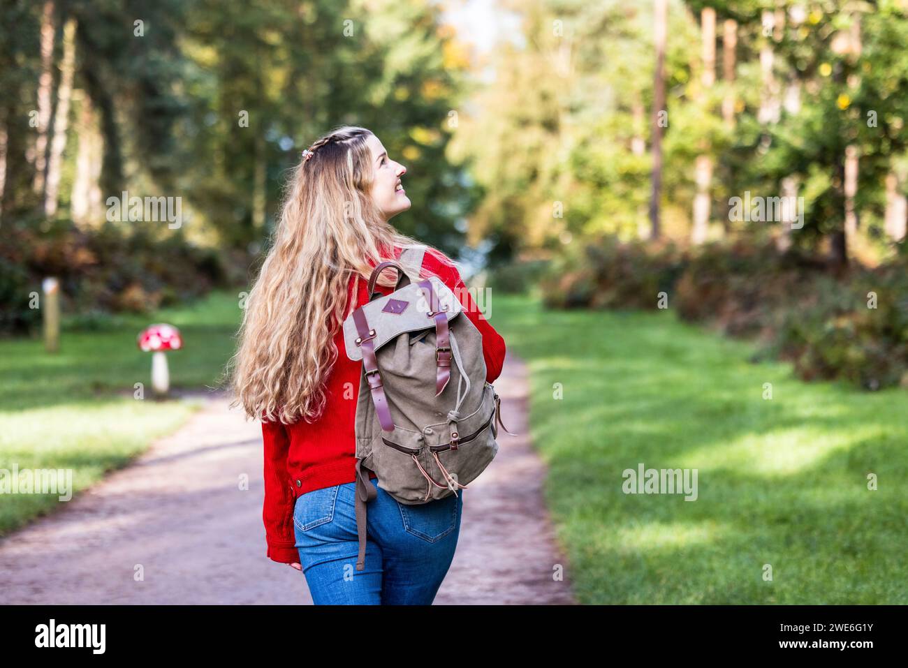 Woman backpack walking in autumn hi-res stock photography and images ...