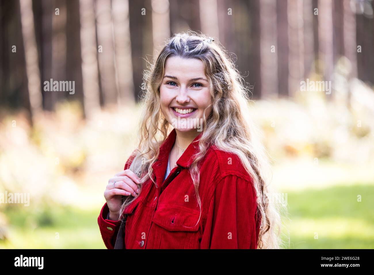 Happy beautiful woman in Cannock chase forest Stock Photo - Alamy