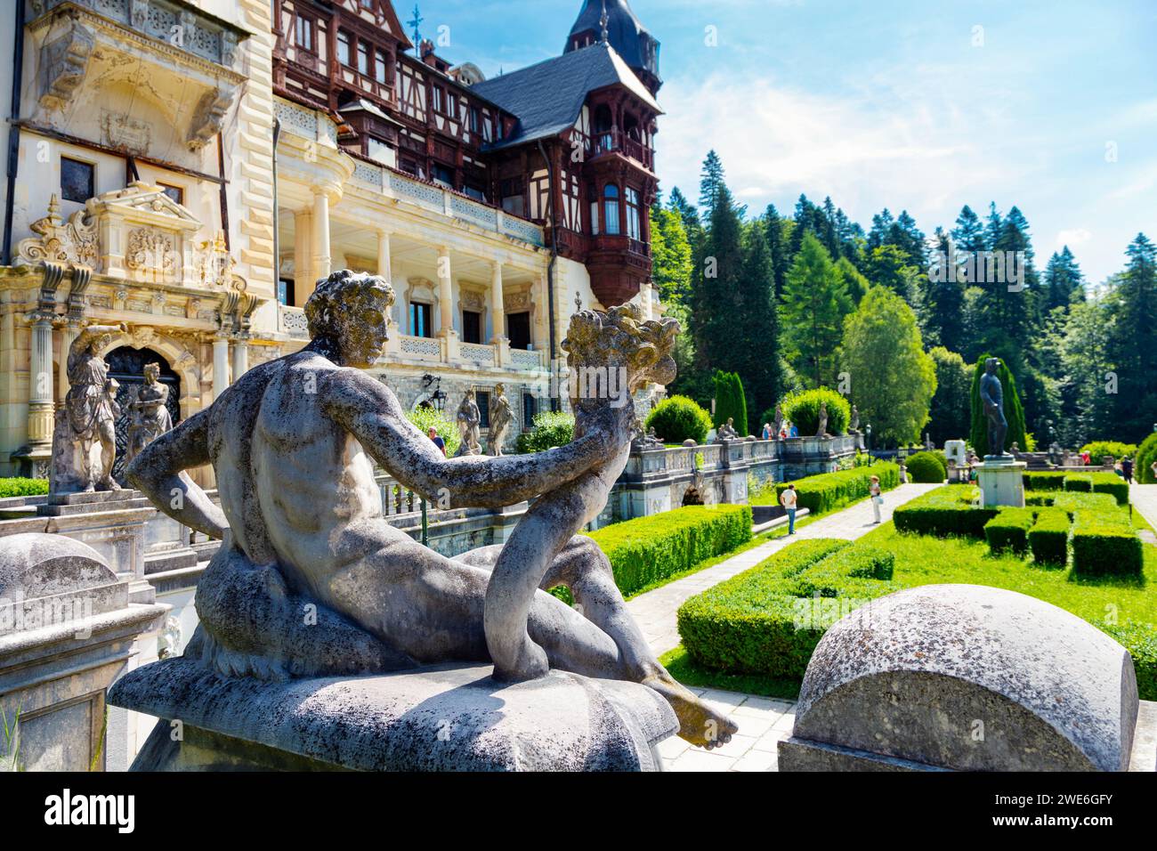 Male reclining statue in the garden of Peles Castle, Sinaia, Romania ...
