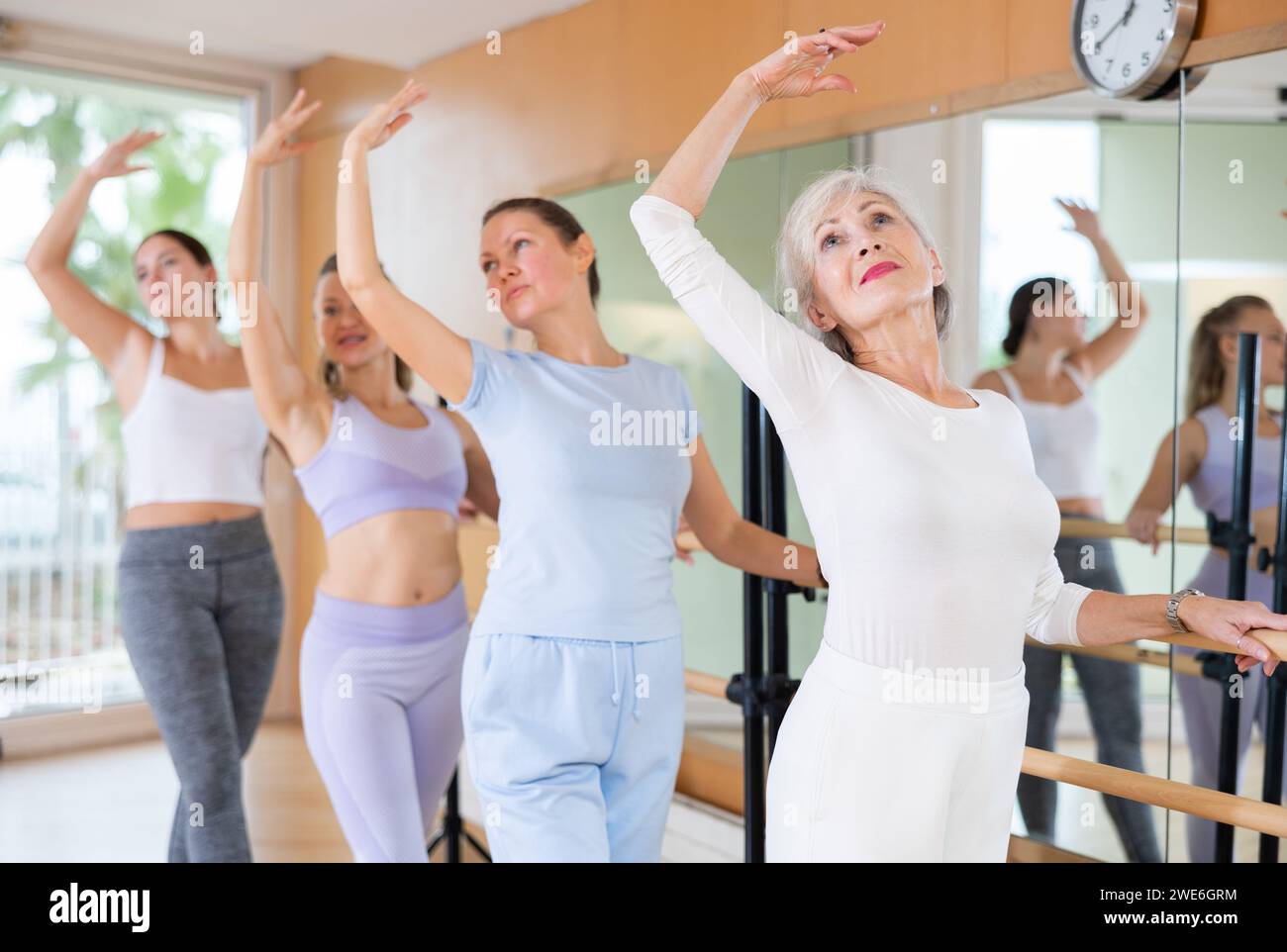 Adults learning to dance ballet in dancing school Stock Photo - Alamy