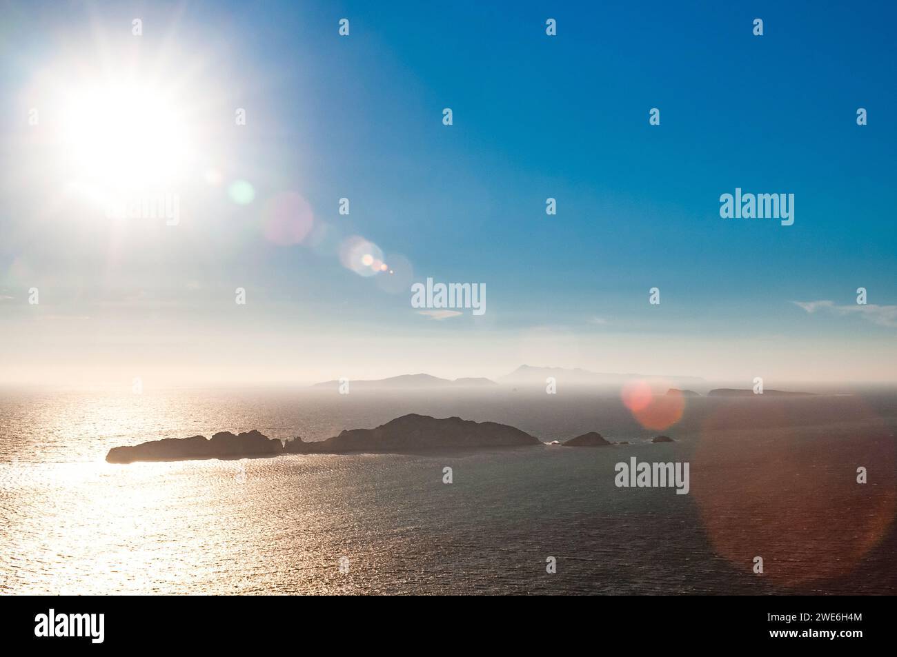 Greece, Ionian Islands, Sun shining over Nisida Kravi island Stock ...