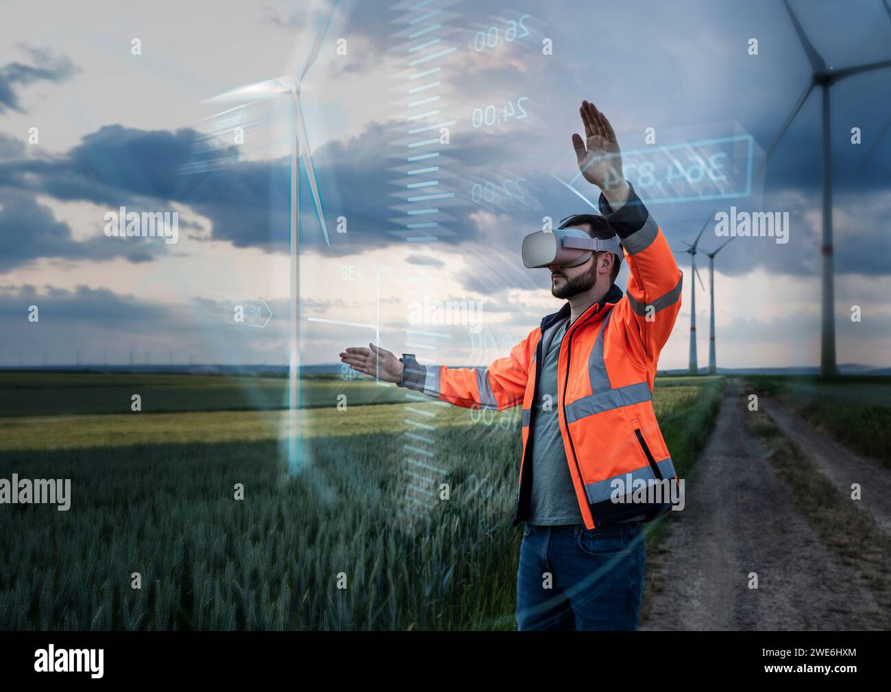 Engineer wearing VR glasses and programming through digital wind ...