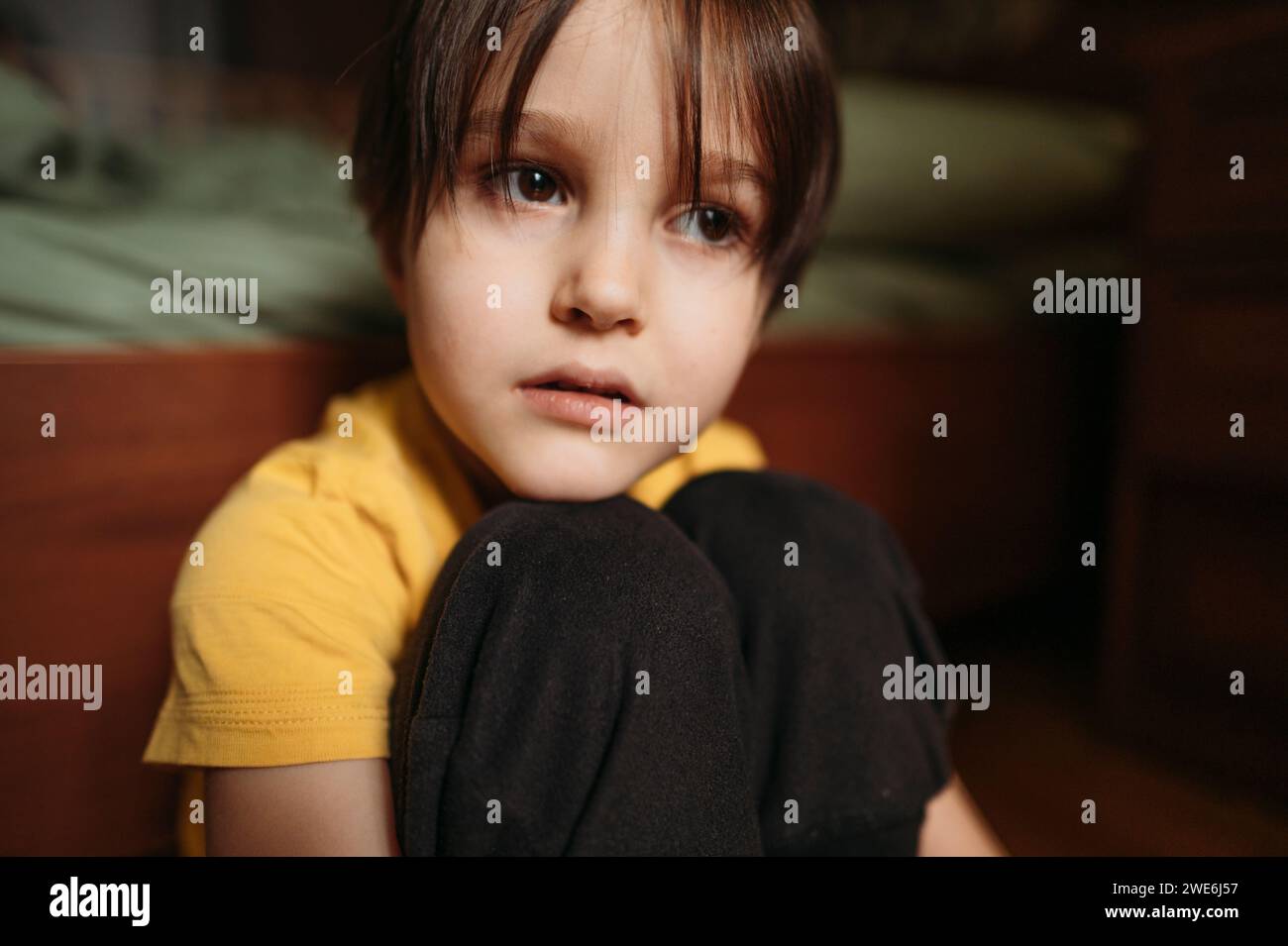 Image sad person sitting alone hi-res stock photography and images - Alamy