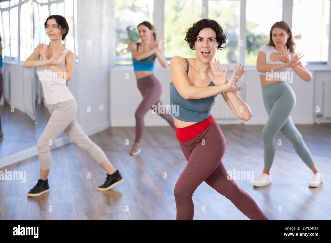 Group of women dancing modern dance in studio Stock Photo - Alamy